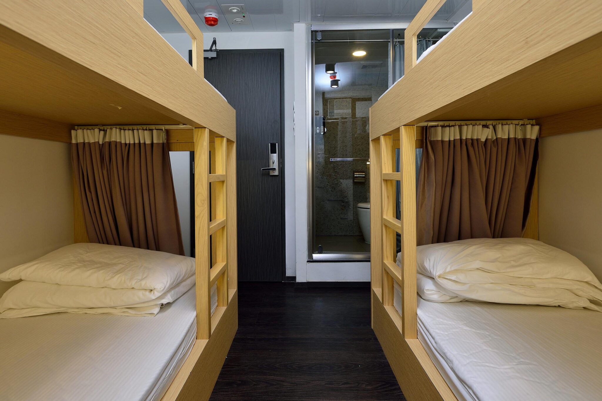 4-Bed Mixed Dorm Room — ATLAS Guesthouse & Backpackers